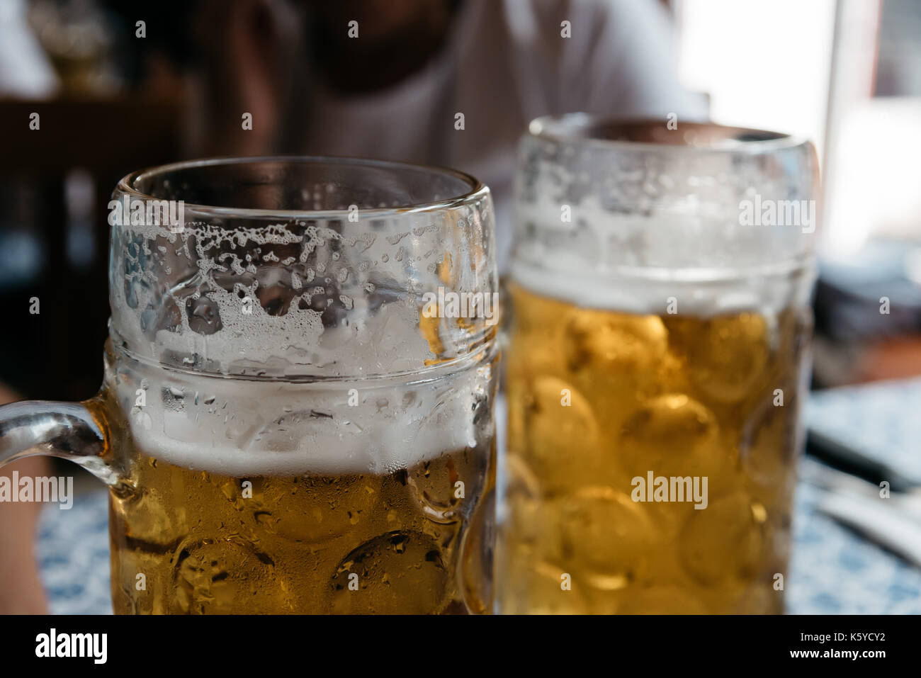 Two beer jars and blur background Stock Photo - Alamy