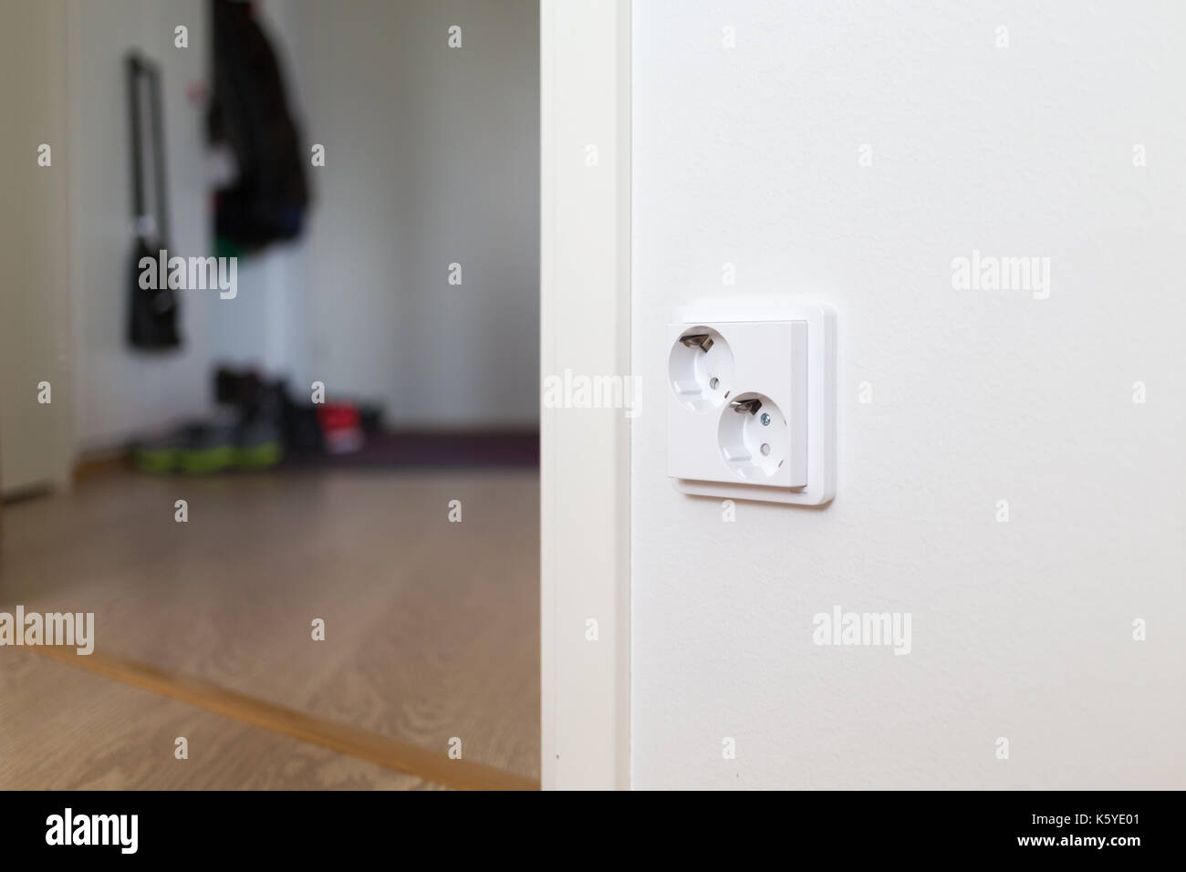 White wall socket on wall Stock Photo - Alamy