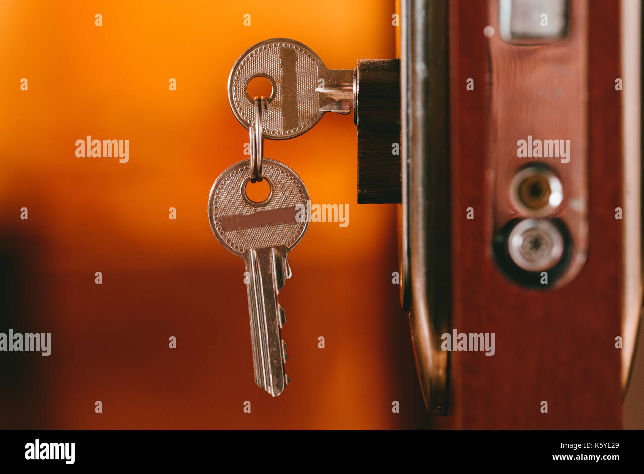 Keys in the door lock. Object photo Stock Photo - Alamy