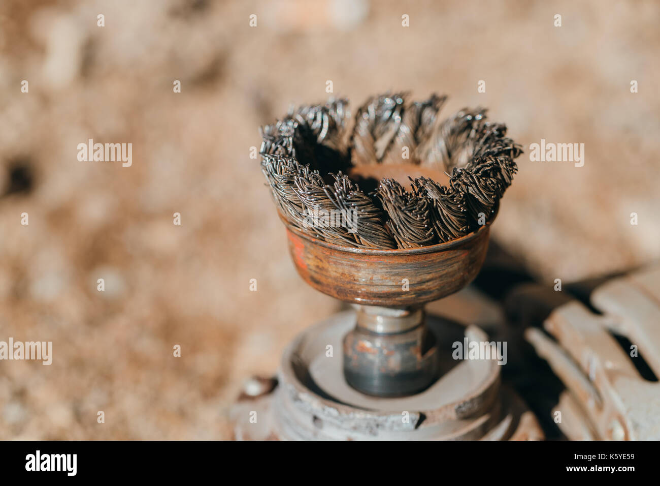 Old and rusty circular wire brush Stock Photo - Alamy