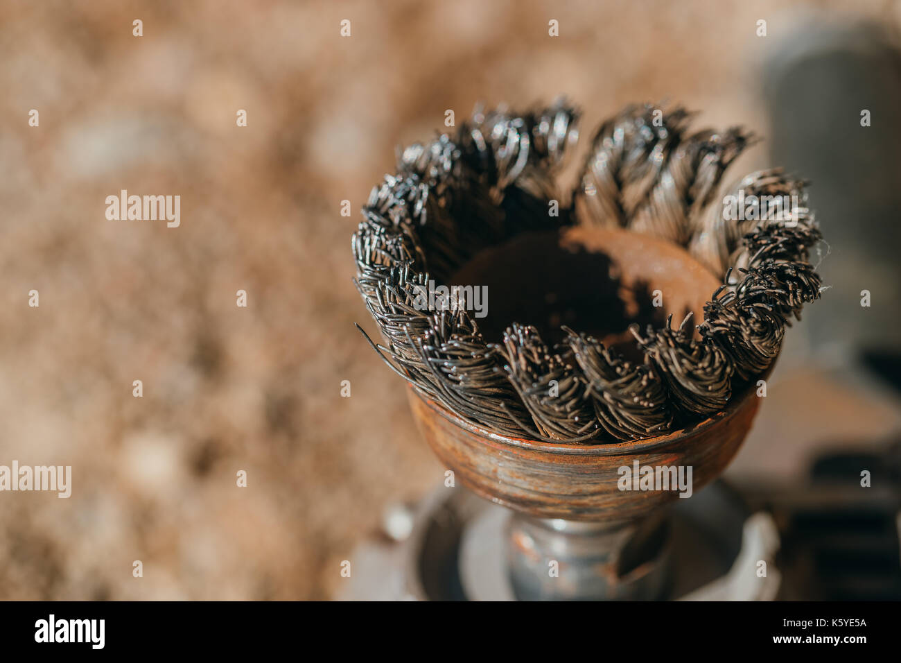 Old and rusty circular wire brush Stock Photo - Alamy