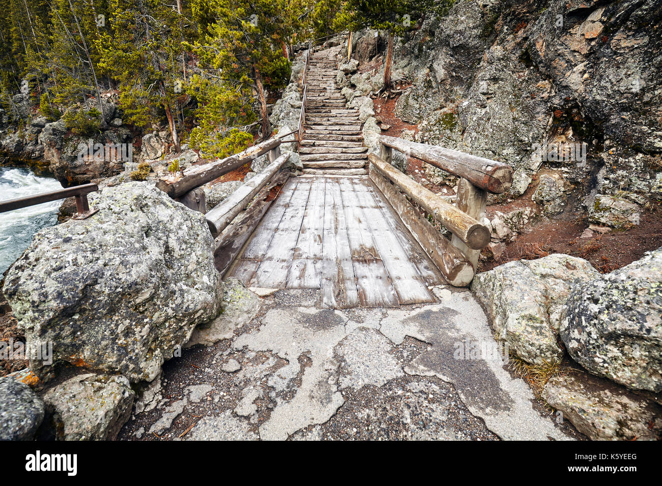 Wooden bridge and stone stairs in the Yellowstone National Park ...