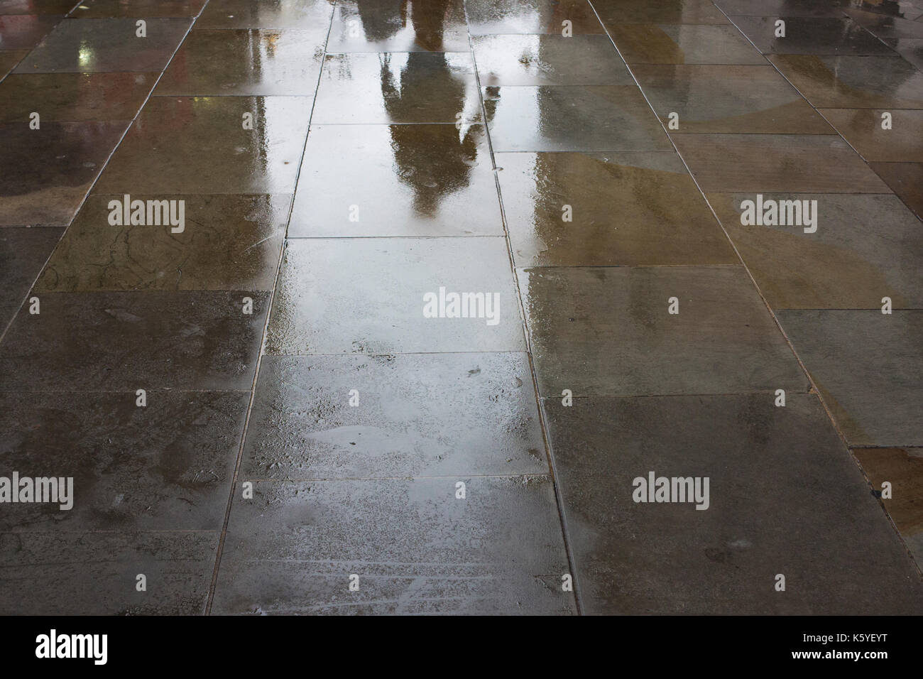 Reflections after the rain in a London street Stock Photo - Alamy
