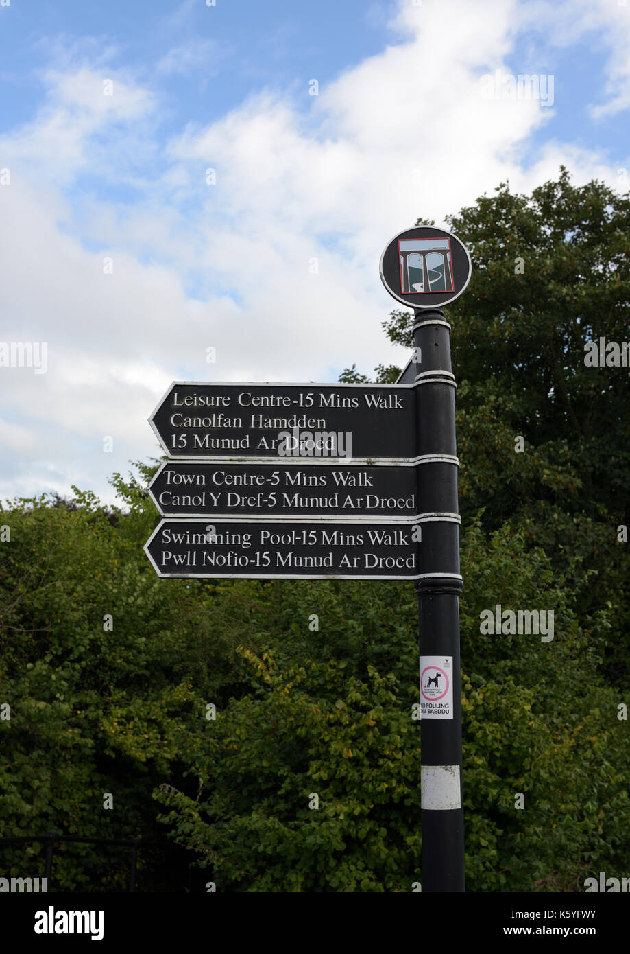 Bilingual welsh and english Black and white finger posts with white ...