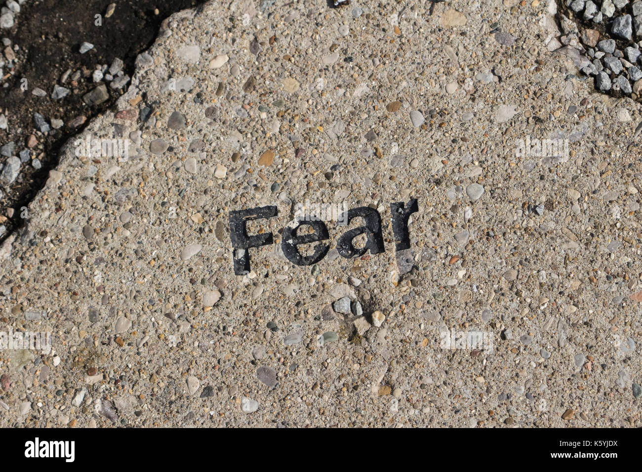 Words written in stone Stock Photo - Alamy