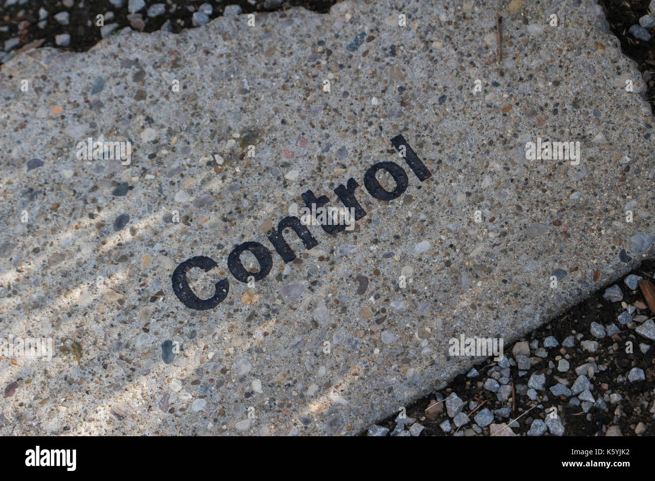 Words written in stone Stock Photo - Alamy