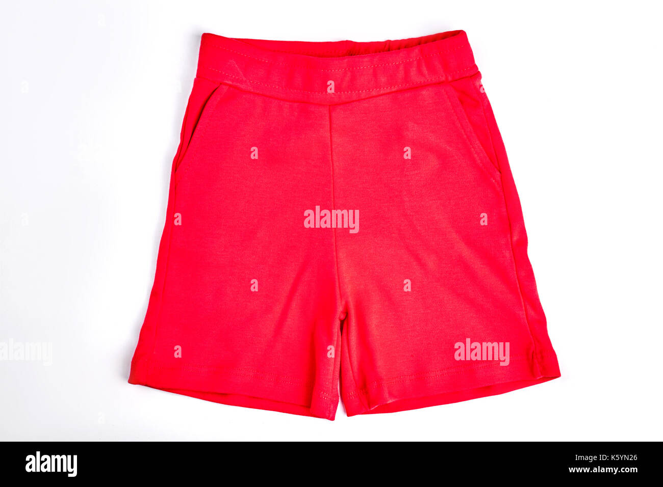 Kids red cotton shorts. Brand organic shorts for childrens isolated on ...