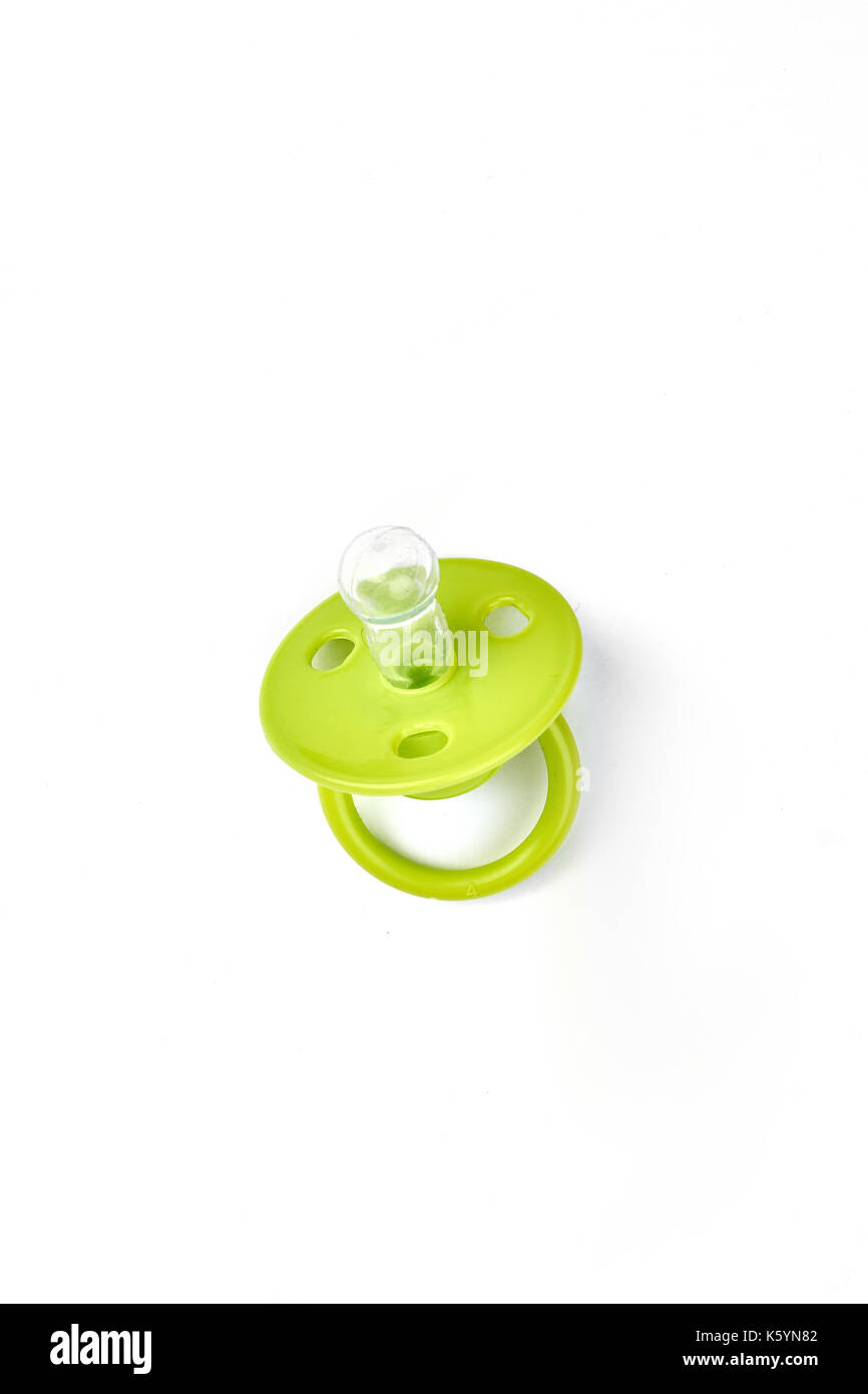 Baby silicone pacifier in green color. Baby green pacifier with rubber ...