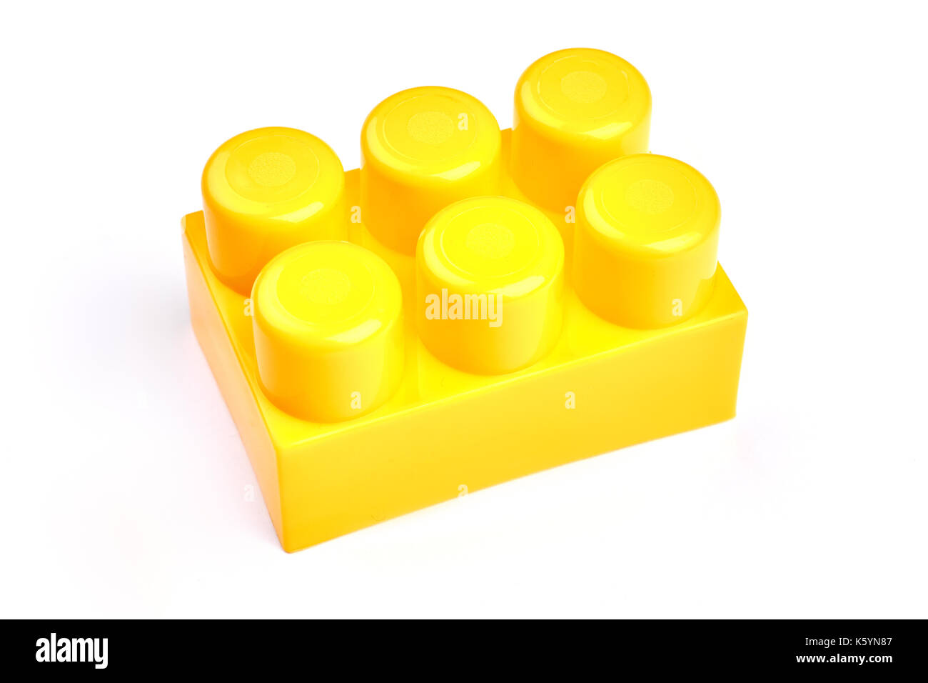 Kids yellow plastic construction element. Plastic construction element ...
