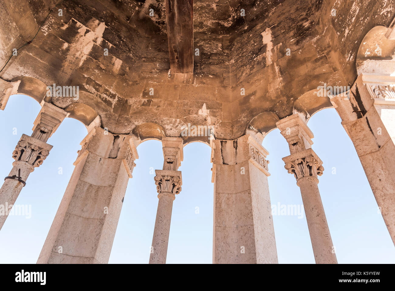 Columns of a high ancient tower Stock Photo - Alamy