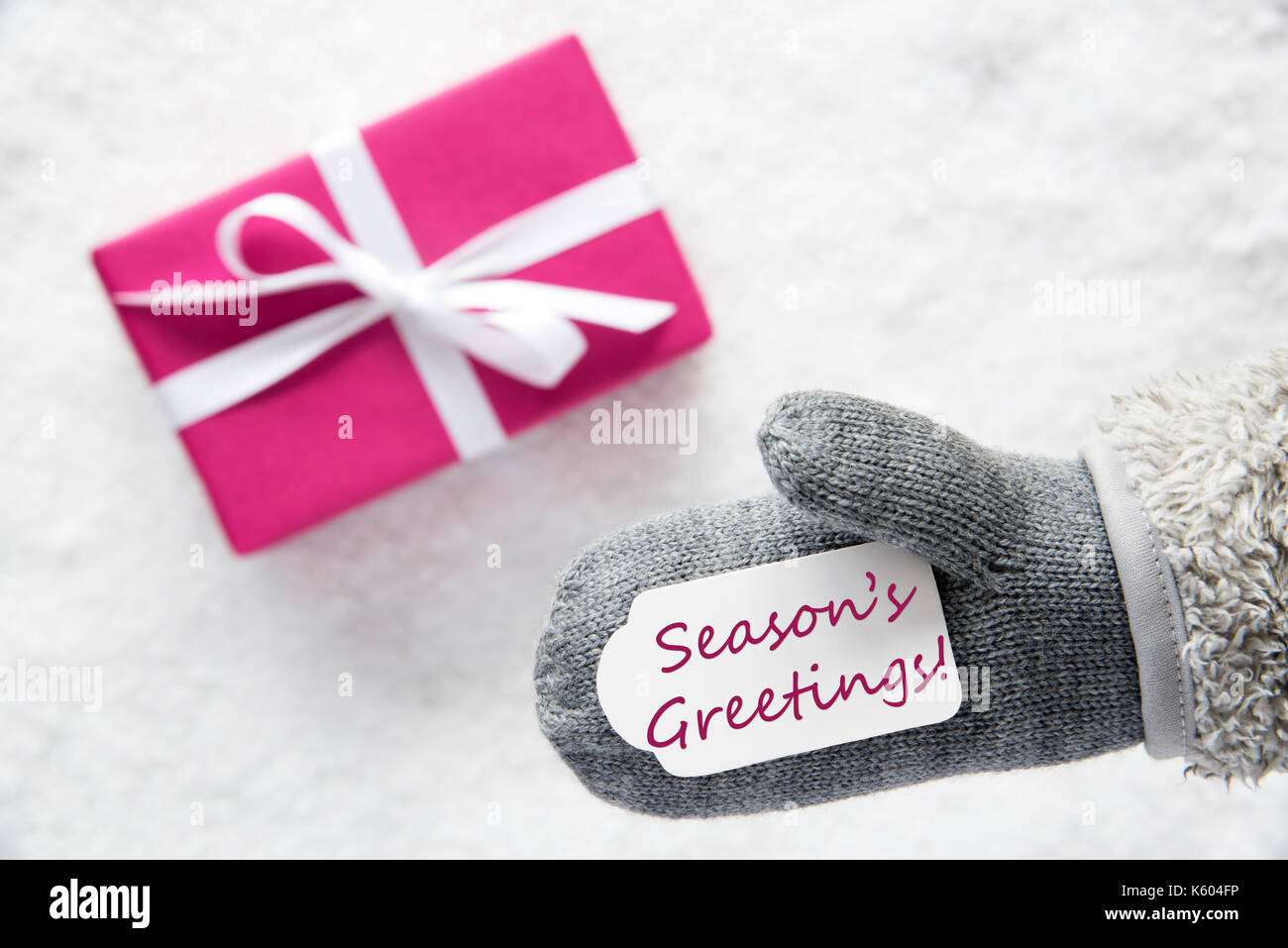 Pink Gift, Glove, Text Seasons Greetings Stock Photo - Alamy