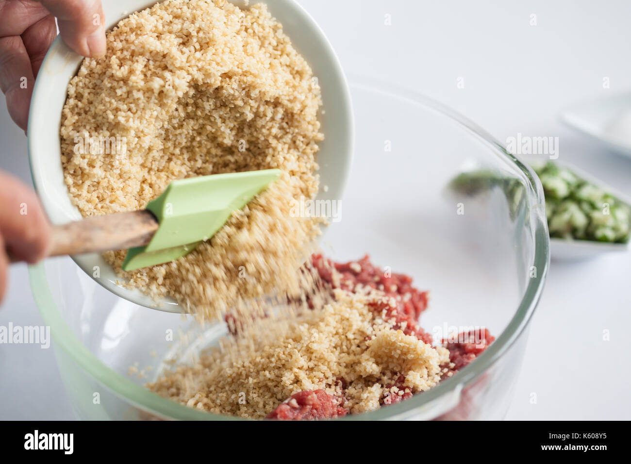 Step by step Levantine cuisine kibbeh preparation : Adding the ...