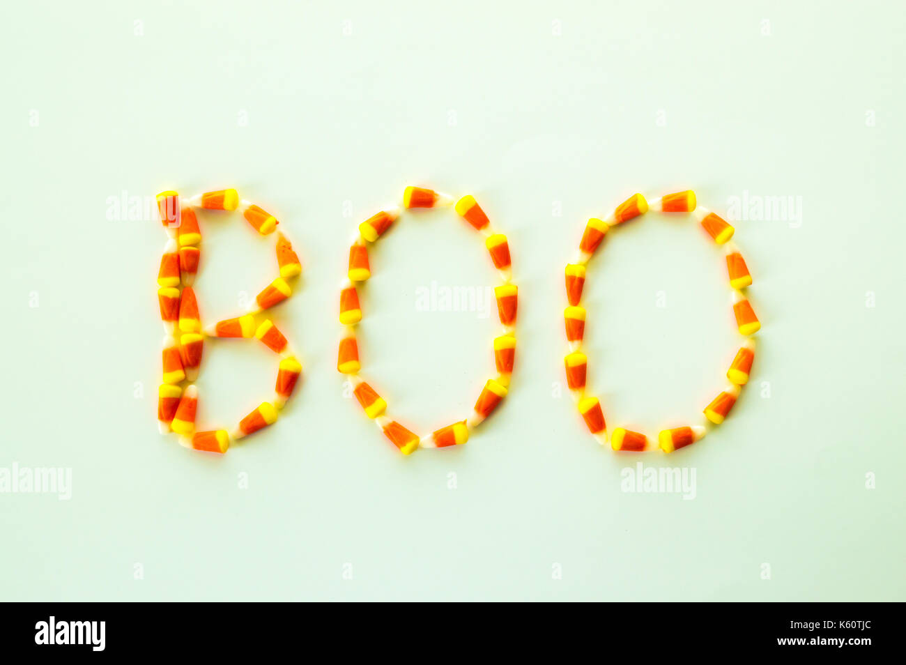candy corn letters spelling BOO isolated on white Stock Photo - Alamy