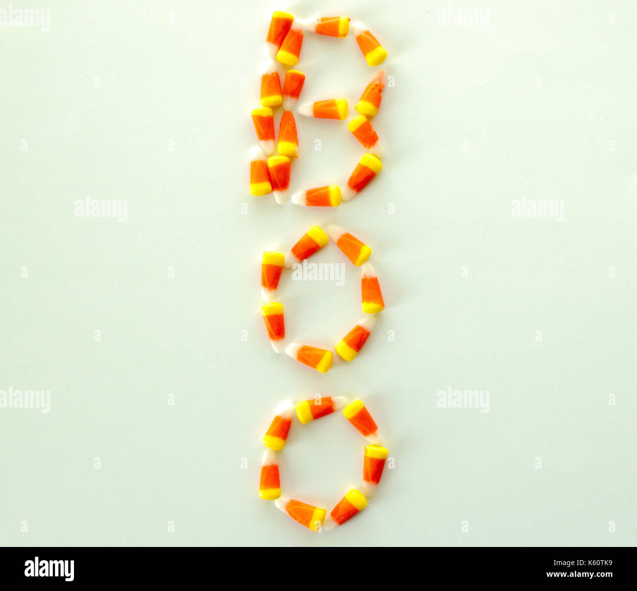candy corn letters spelling BOO isolated on white Stock Photo - Alamy