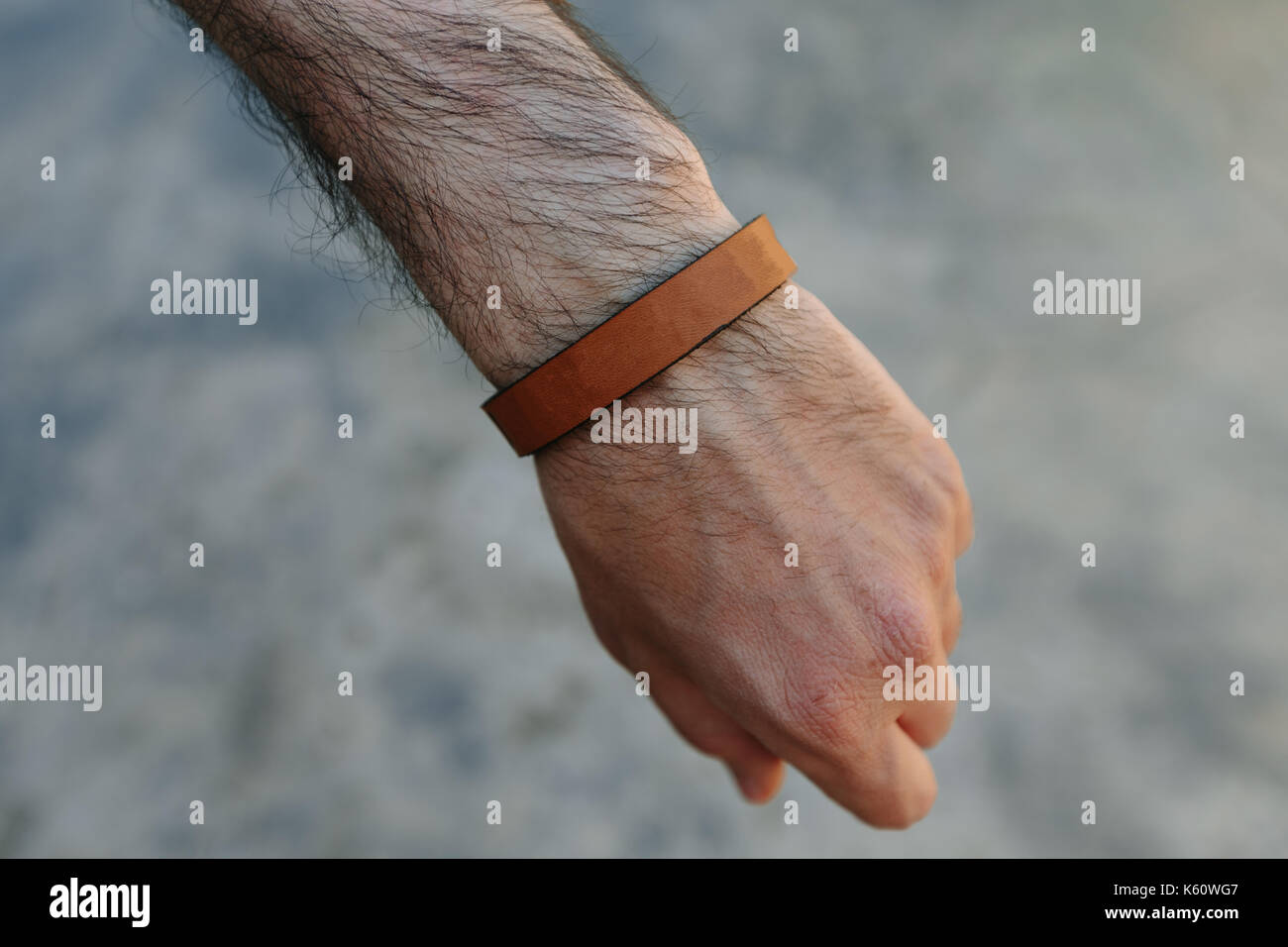 Leather strap on the arm Stock Photo - Alamy