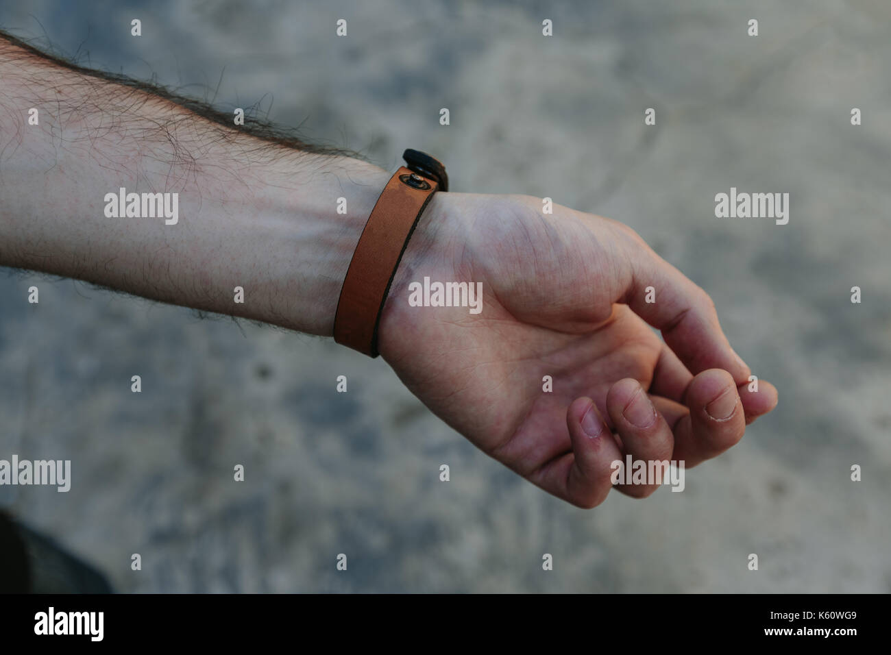 Leather strap on the arm Stock Photo - Alamy
