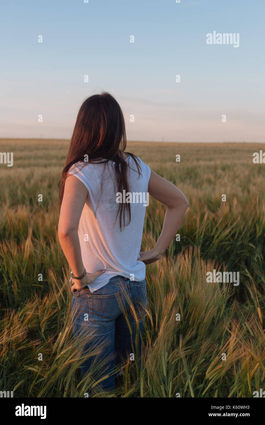 Beautiful girl in the field Stock Photo - Alamy