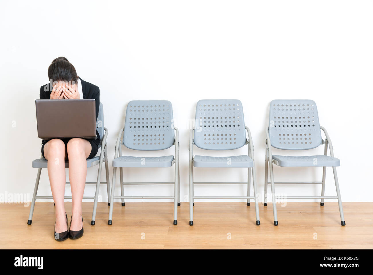 sweet pretty office worker woman using mobile computer feeling sadness ...