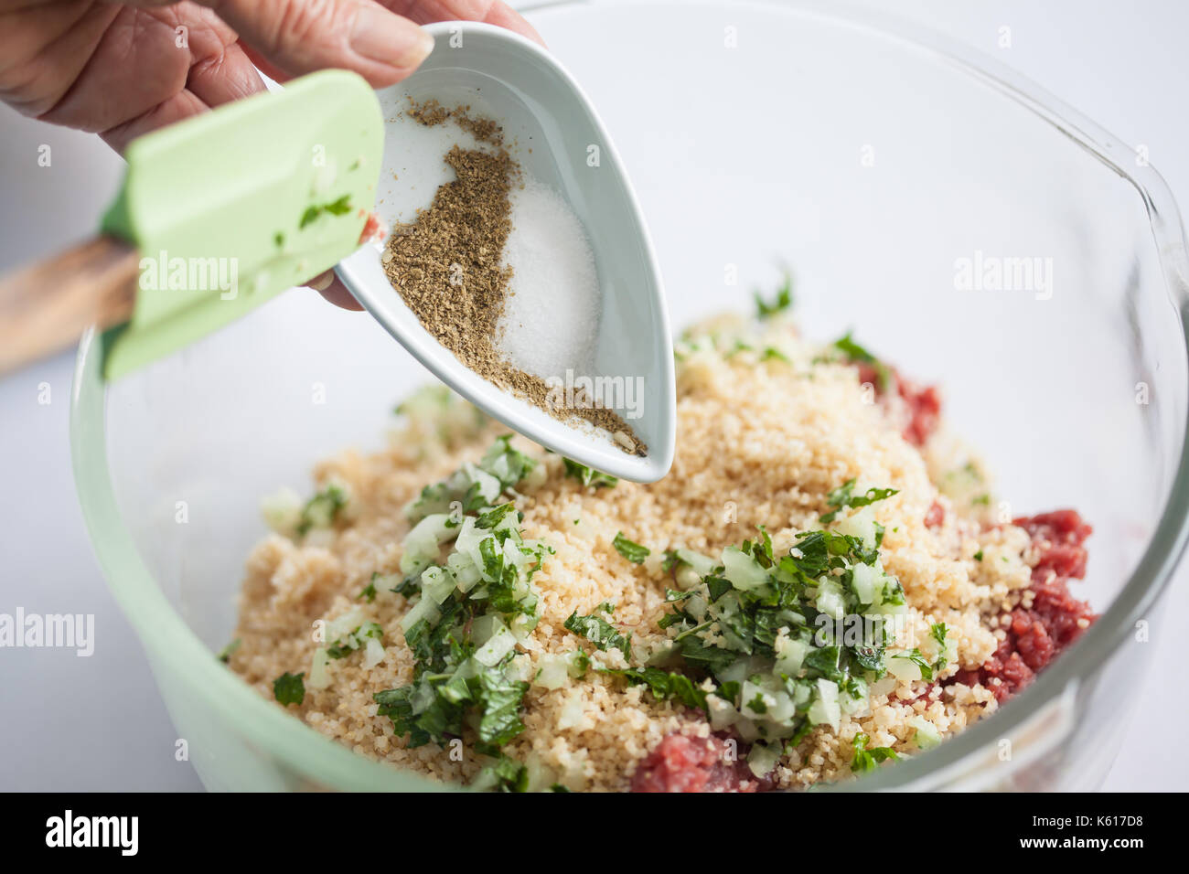 Step by step Levantine cuisine kibbeh preparation : Adding the ...