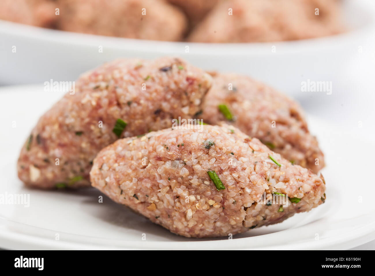 Step by step Levantine cuisine kibbeh preparation : Raw kibbeh balls on ...