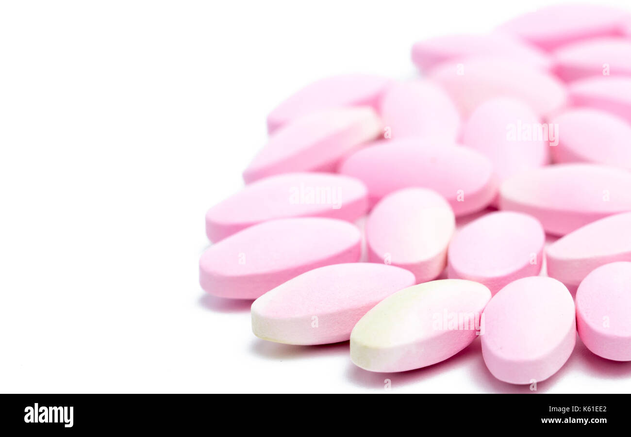 Expired calcium tablet pills with color change isolated on white ...