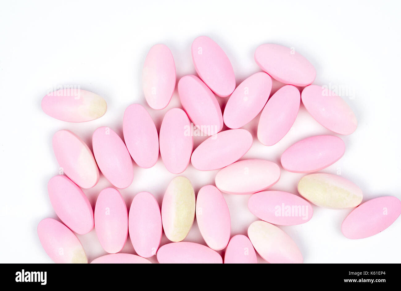 Expired calcium tablet pills with color change isolated on white ...