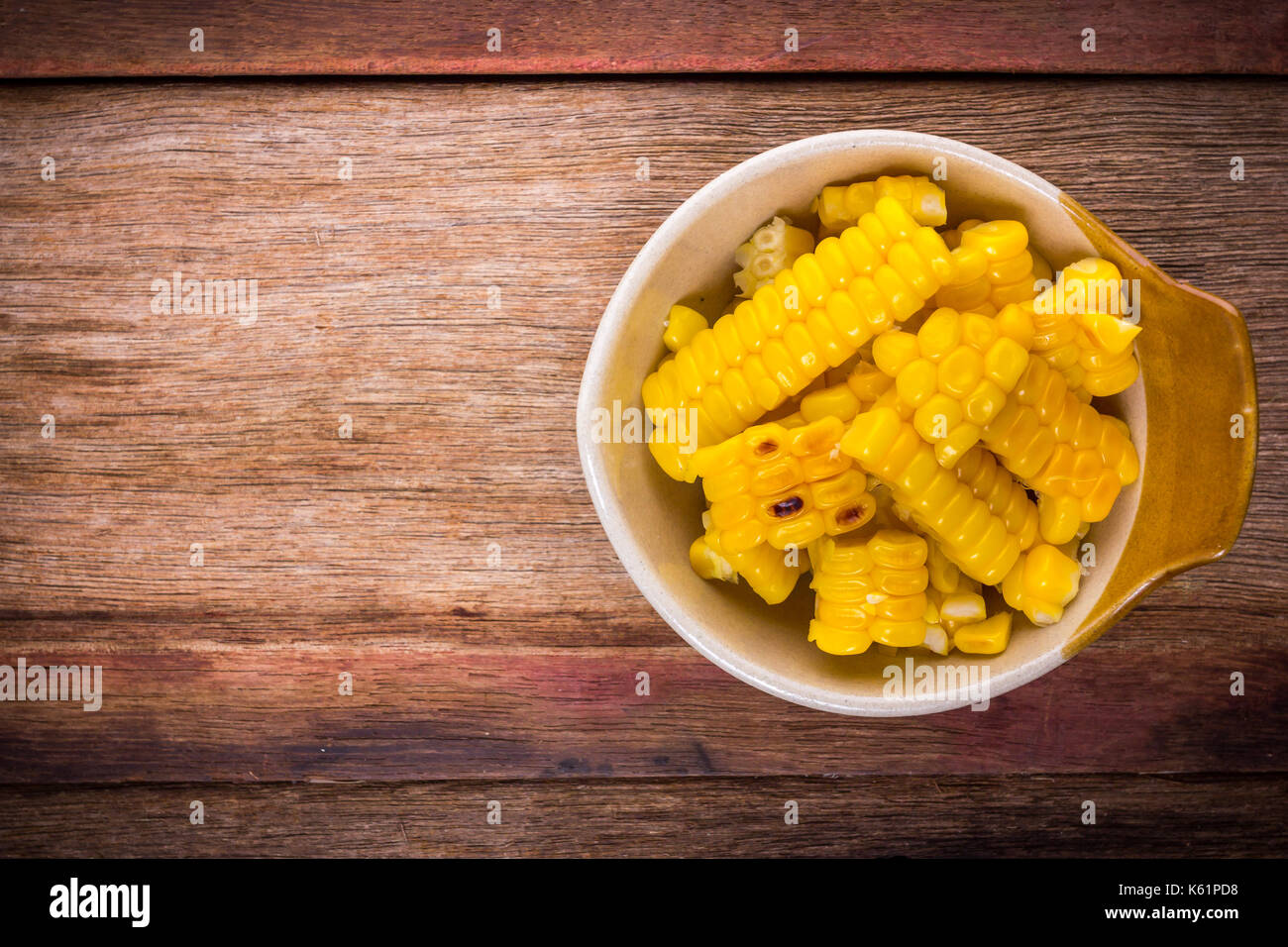 split corn on wood background, View from above with copy space Stock ...