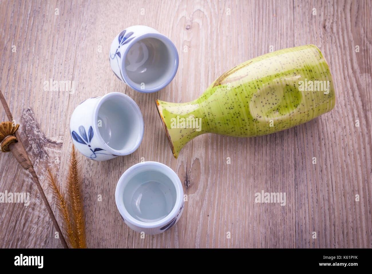Japanese Sake drinking set on old wood texture background Stock Photo ...