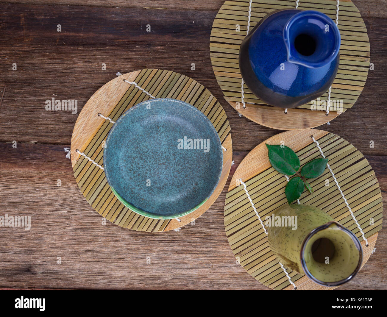 Japanese Sake drinking set on old wood texture background Stock Photo ...