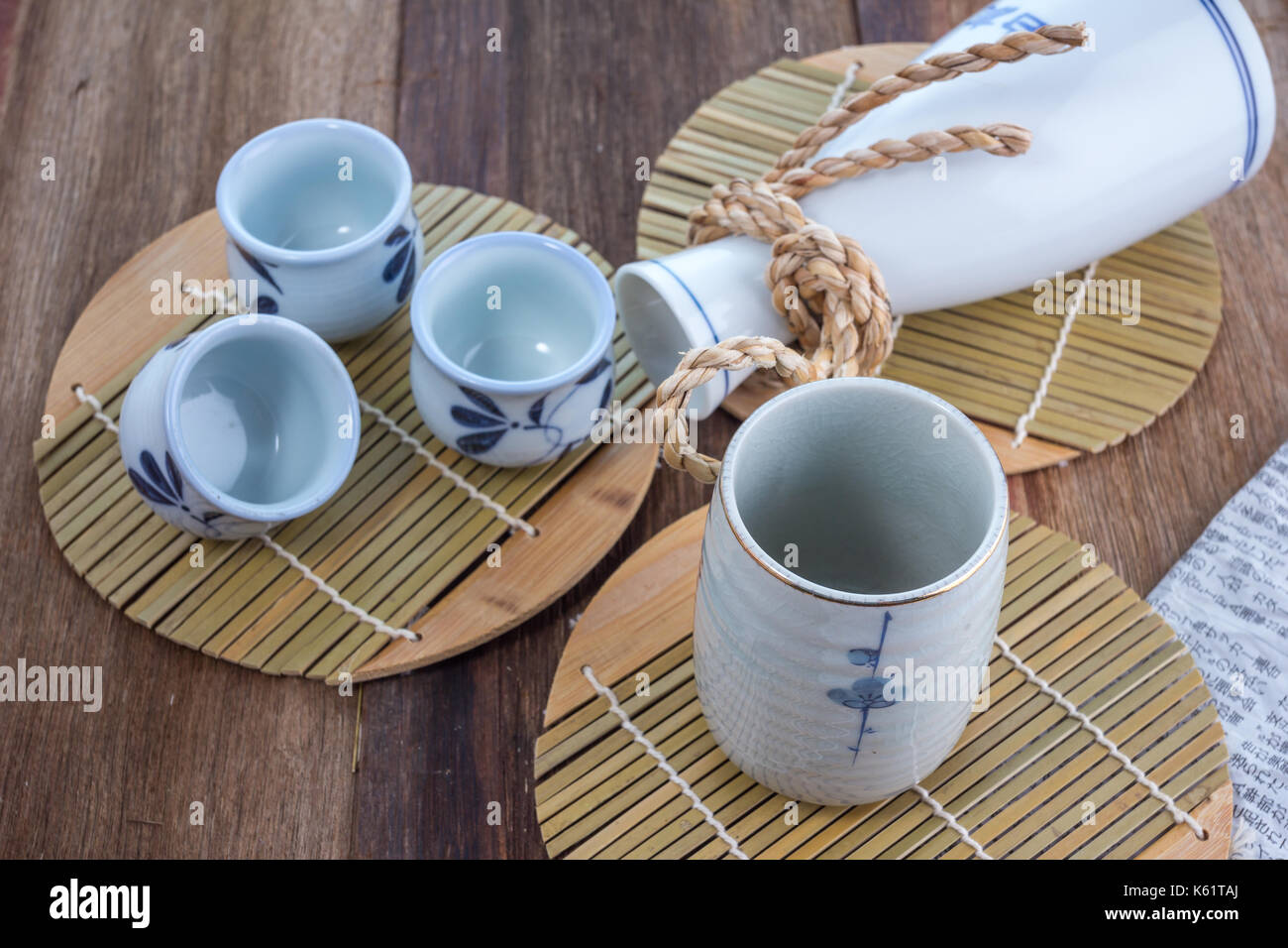 Japanese Sake drinking set on old wood texture background Stock Photo ...