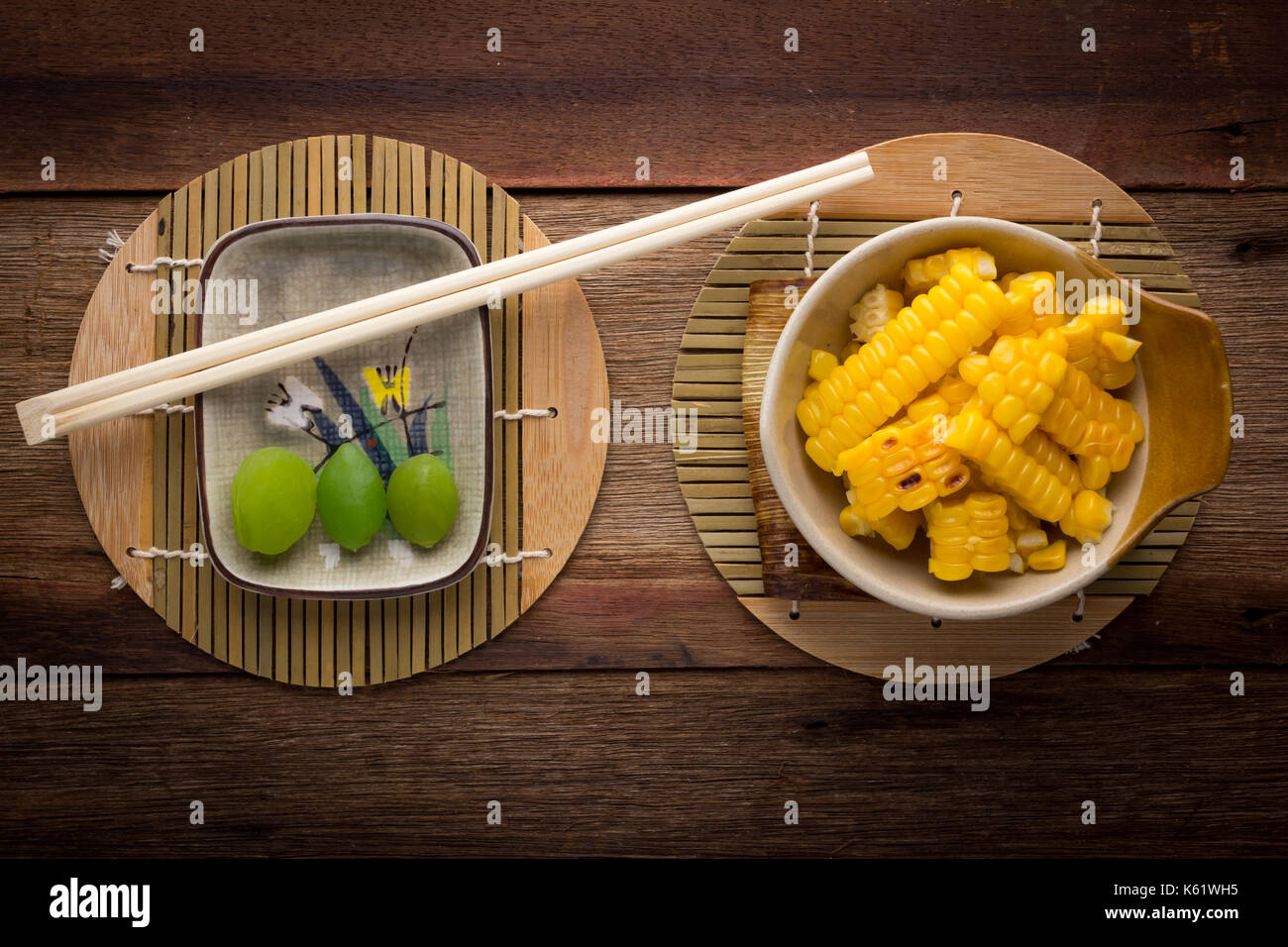 split corn on wood background, View from above with copy space Stock ...