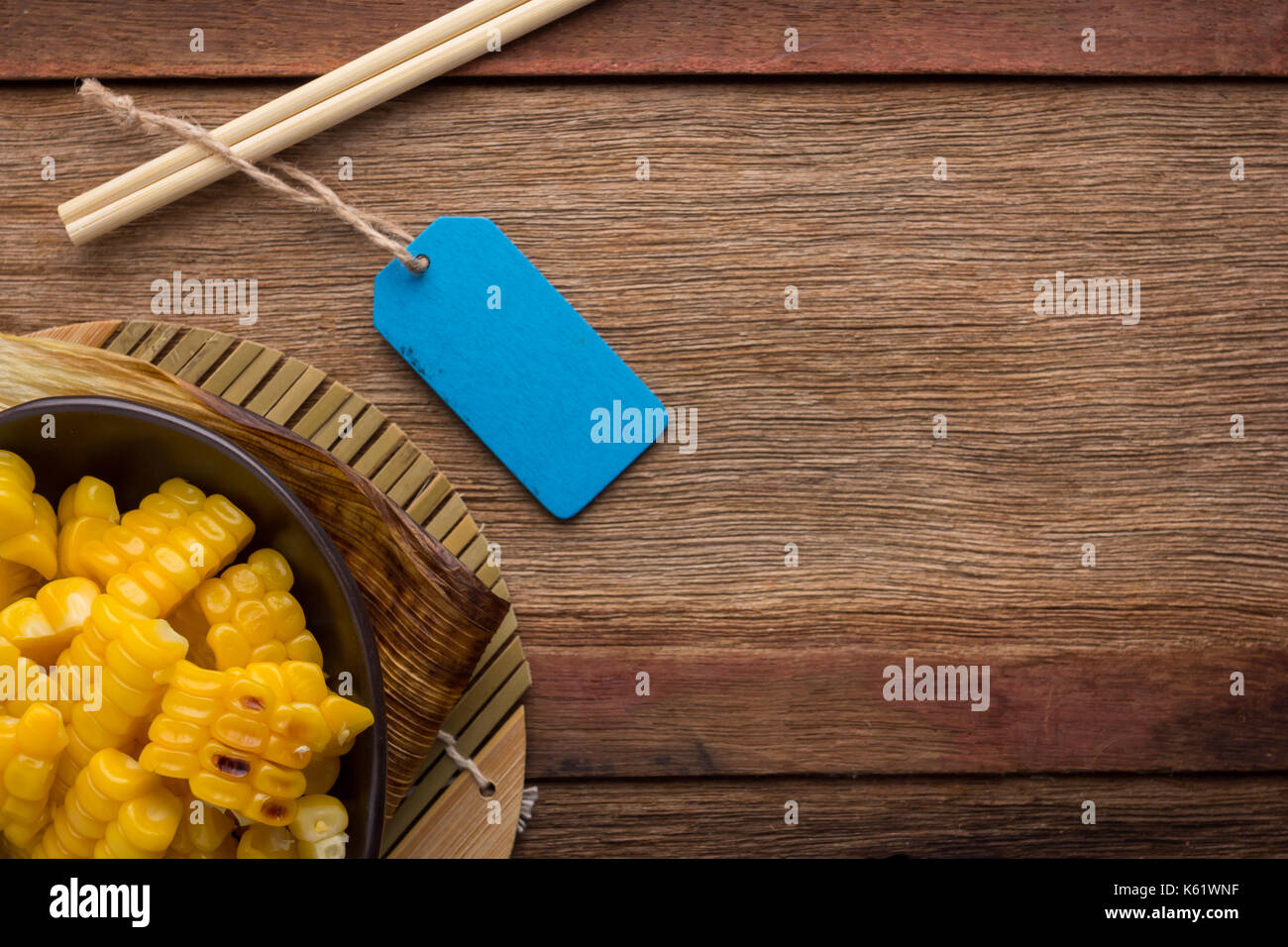 split corn on wood background, View from above with copy space Stock ...