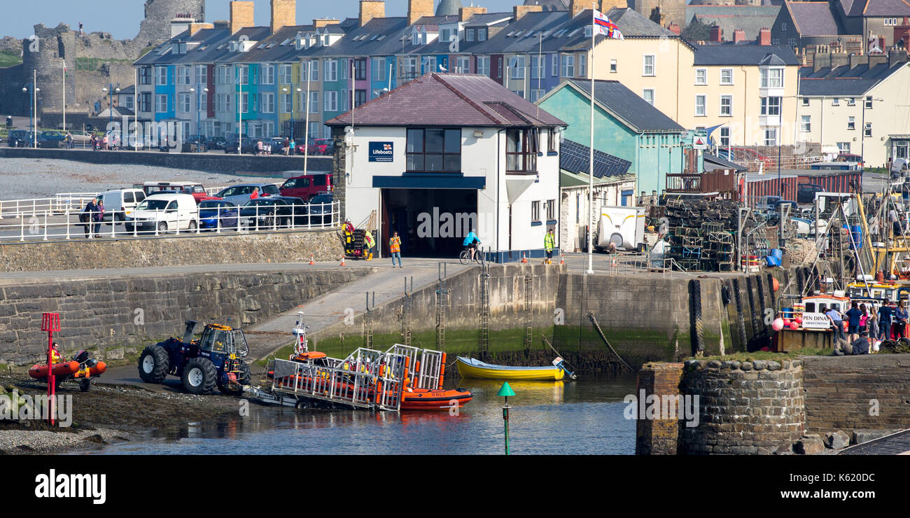 Aberystwyth lifeboat being launched into the harbour with the crew ...