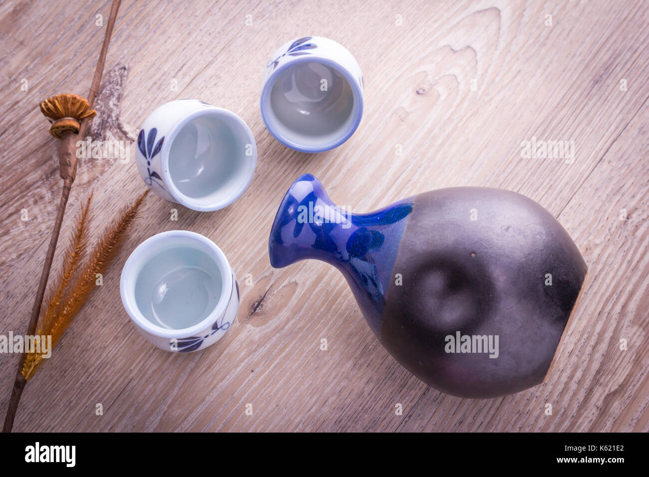 Japanese Sake drinking set on old wood texture background Stock Photo ...