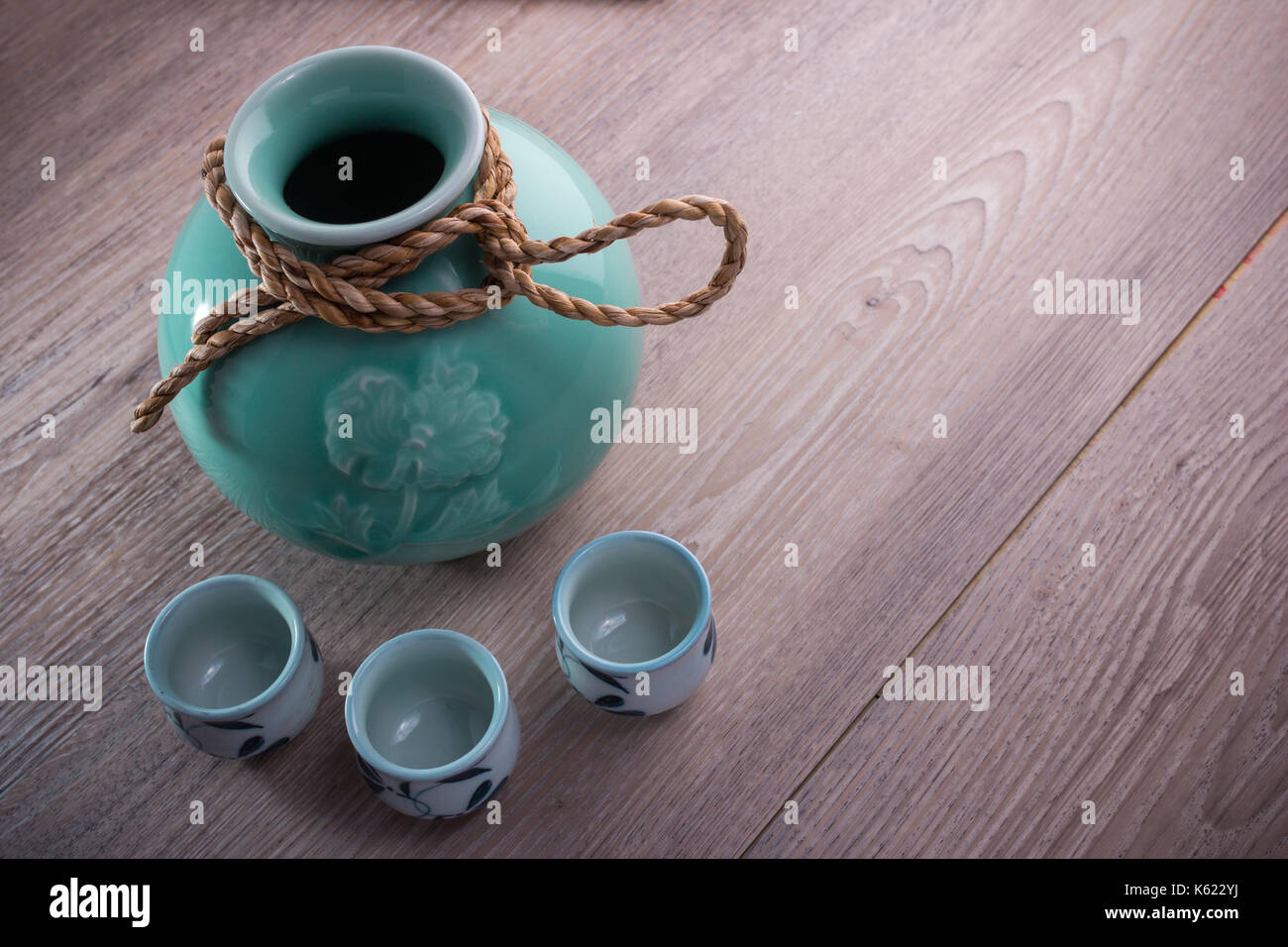 japan sake bottle set on wood background Stock Photo - Alamy