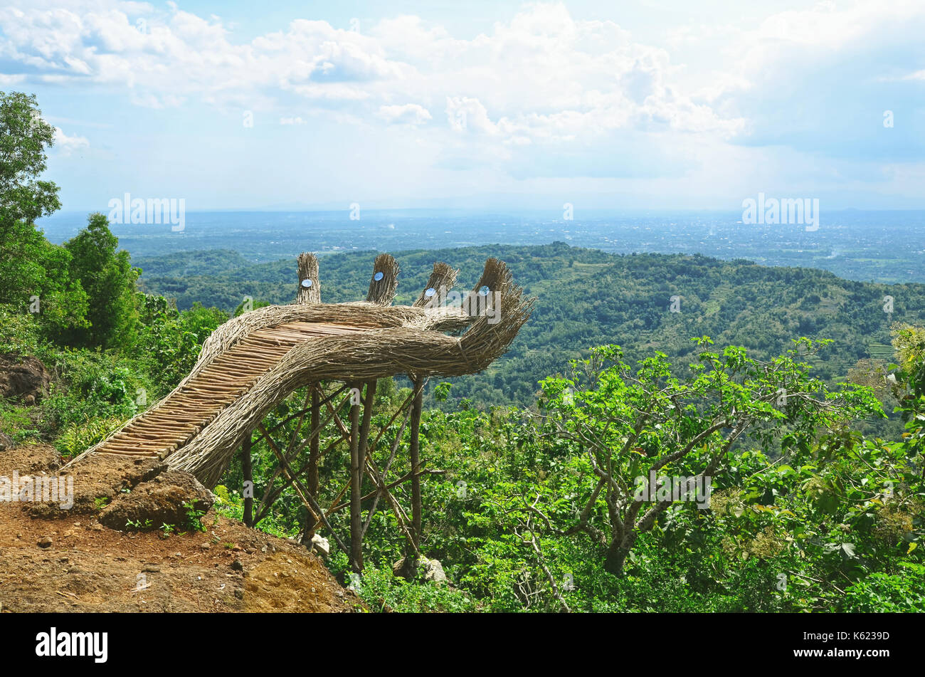 Hand-shaped wooden platform by the cliff Stock Photo - Alamy