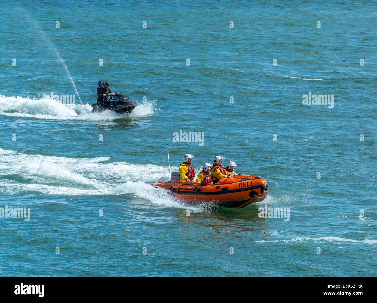 The inshore lifeboat races around the bay at Moelfre Lifeboat Day 2017 ...