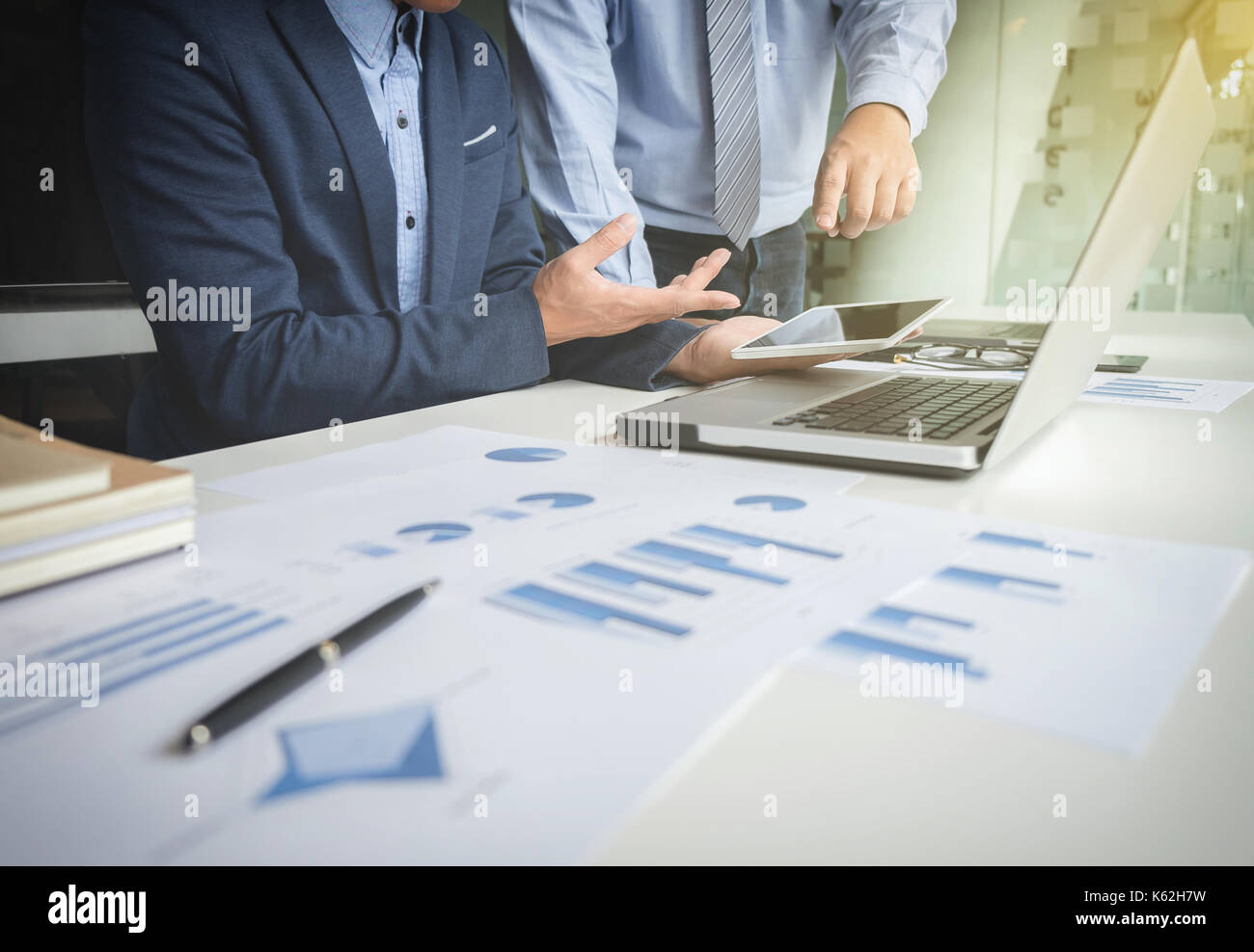 Teamwork process, Businessmen hands pointing at tablet, laptop and ...