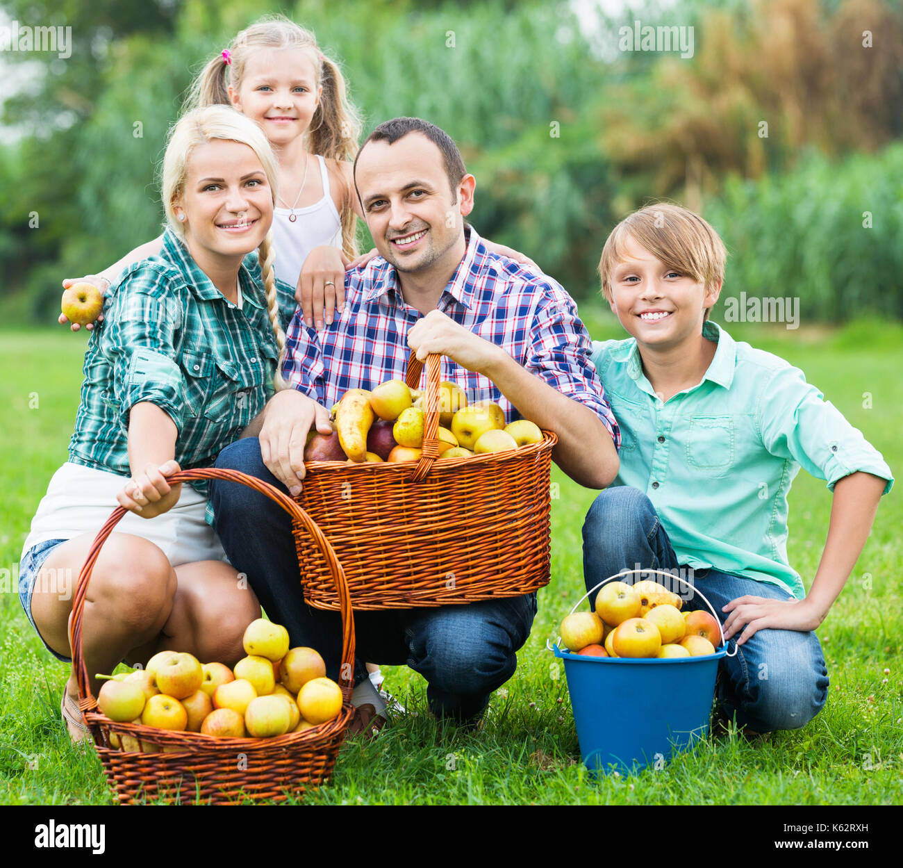 Children with baskets hi-res stock photography and images - Alamy