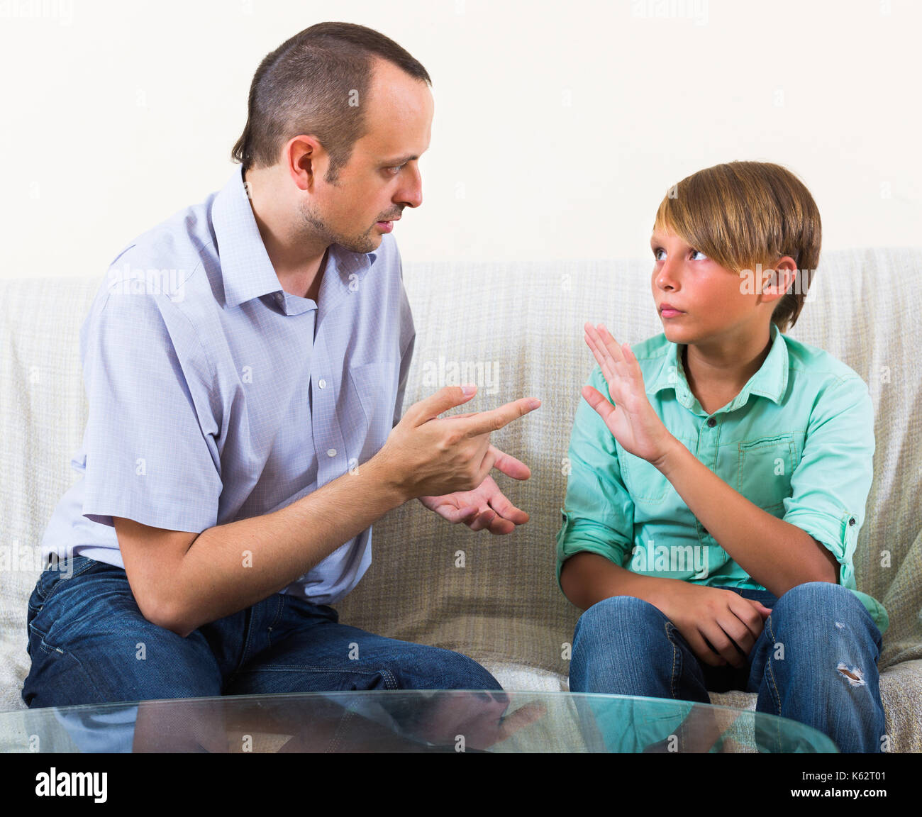 Father son talking serious hi-res stock photography and images - Alamy