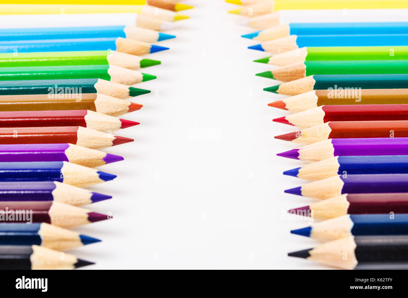 Many different colored pencils on white background Stock Photo - Alamy