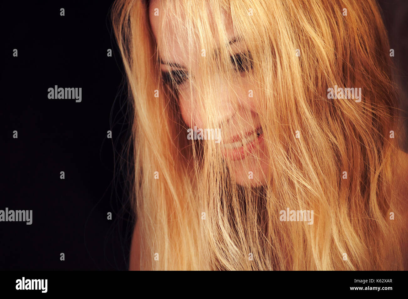 Hair over face Stock Photo - Alamy