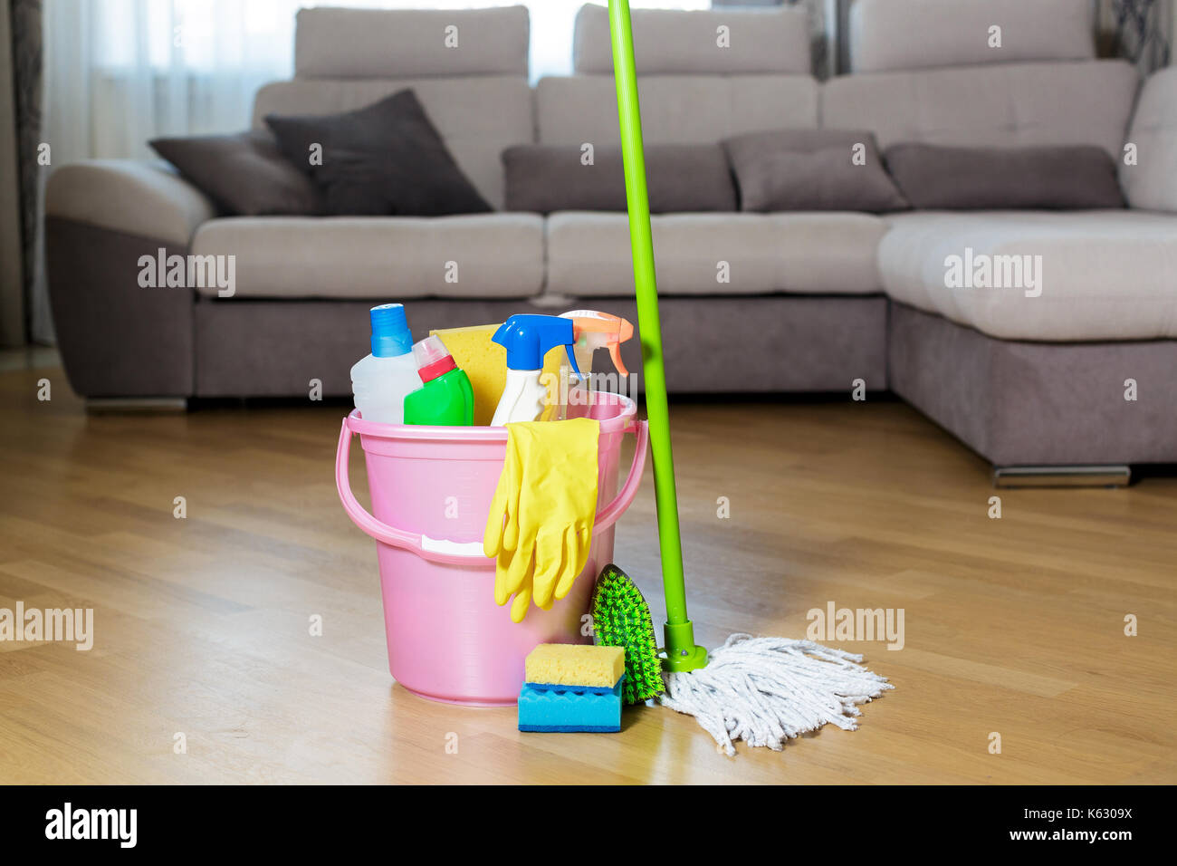 Plastic bucket with cleaning product at home Stock Photo - Alamy
