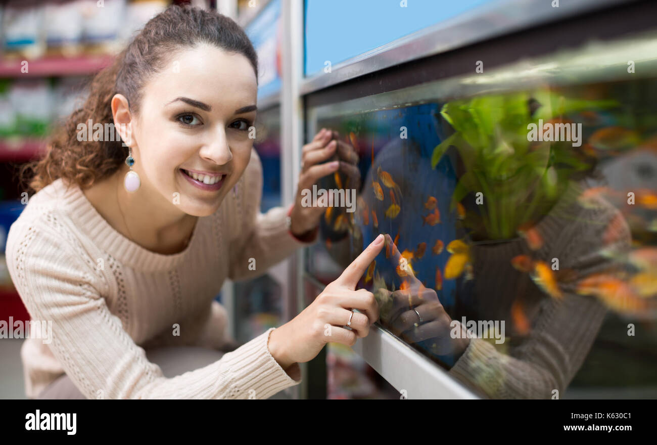 Girl watching pet fish hi-res stock photography and images - Alamy