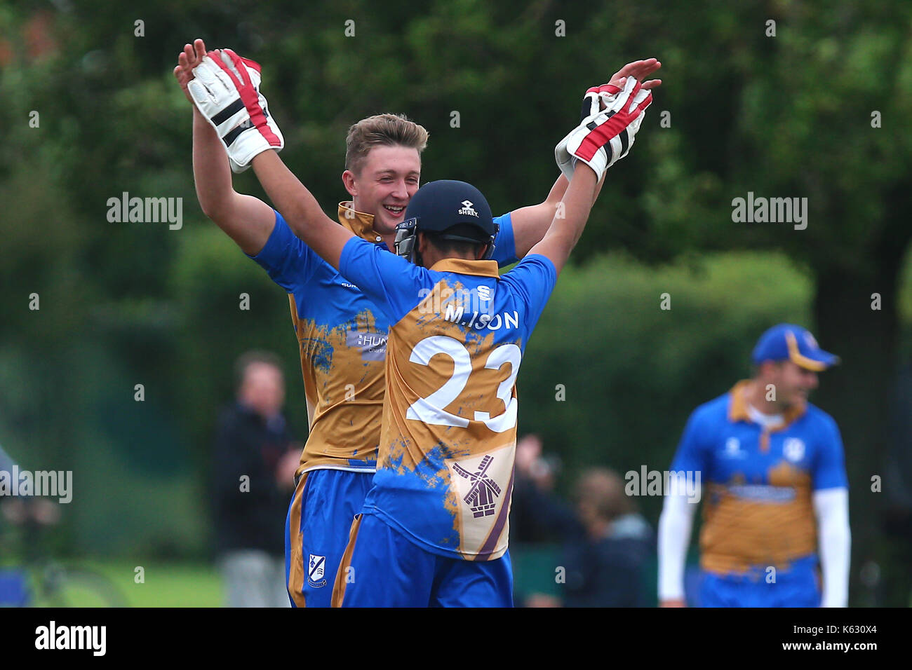 Upminster celebrate the wicket of Nick Browne during Upminster CC vs ...