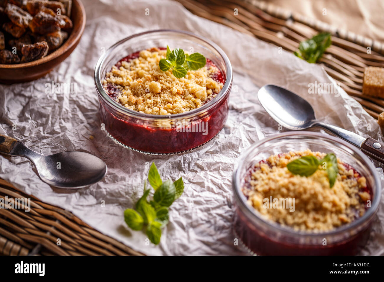 Crumble cake dessert. Pie with red berries Stock Photo - Alamy