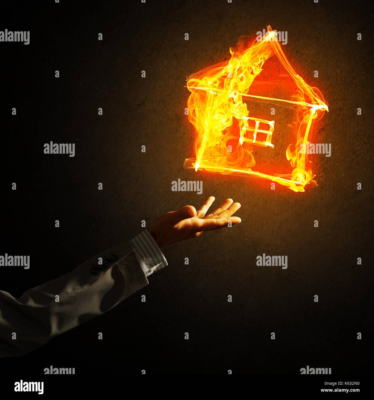 Businessman hand pointing at burning fire symbol Stock Photo - Alamy
