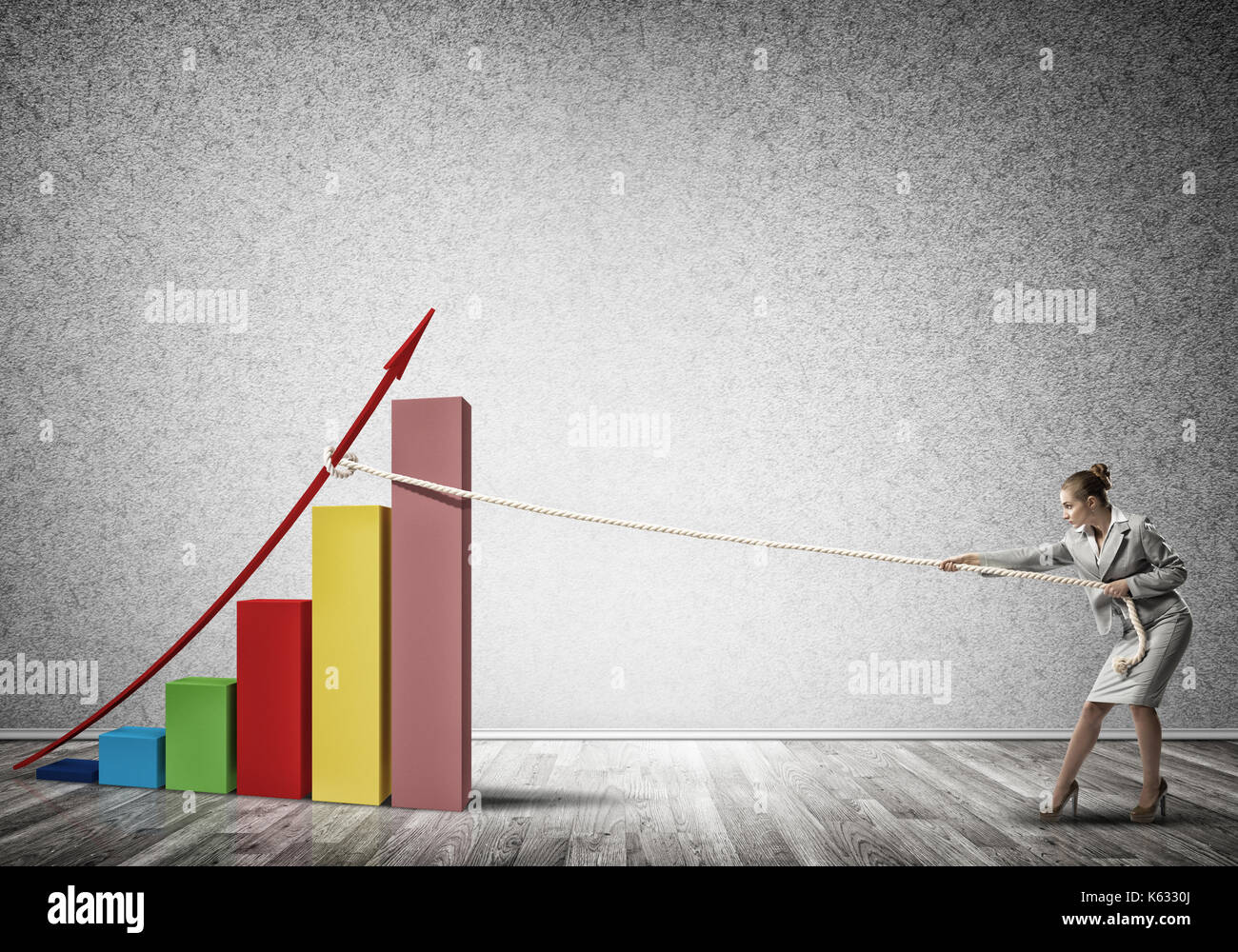 Businesswoman pulling graph with rope as symbol of power and control ...