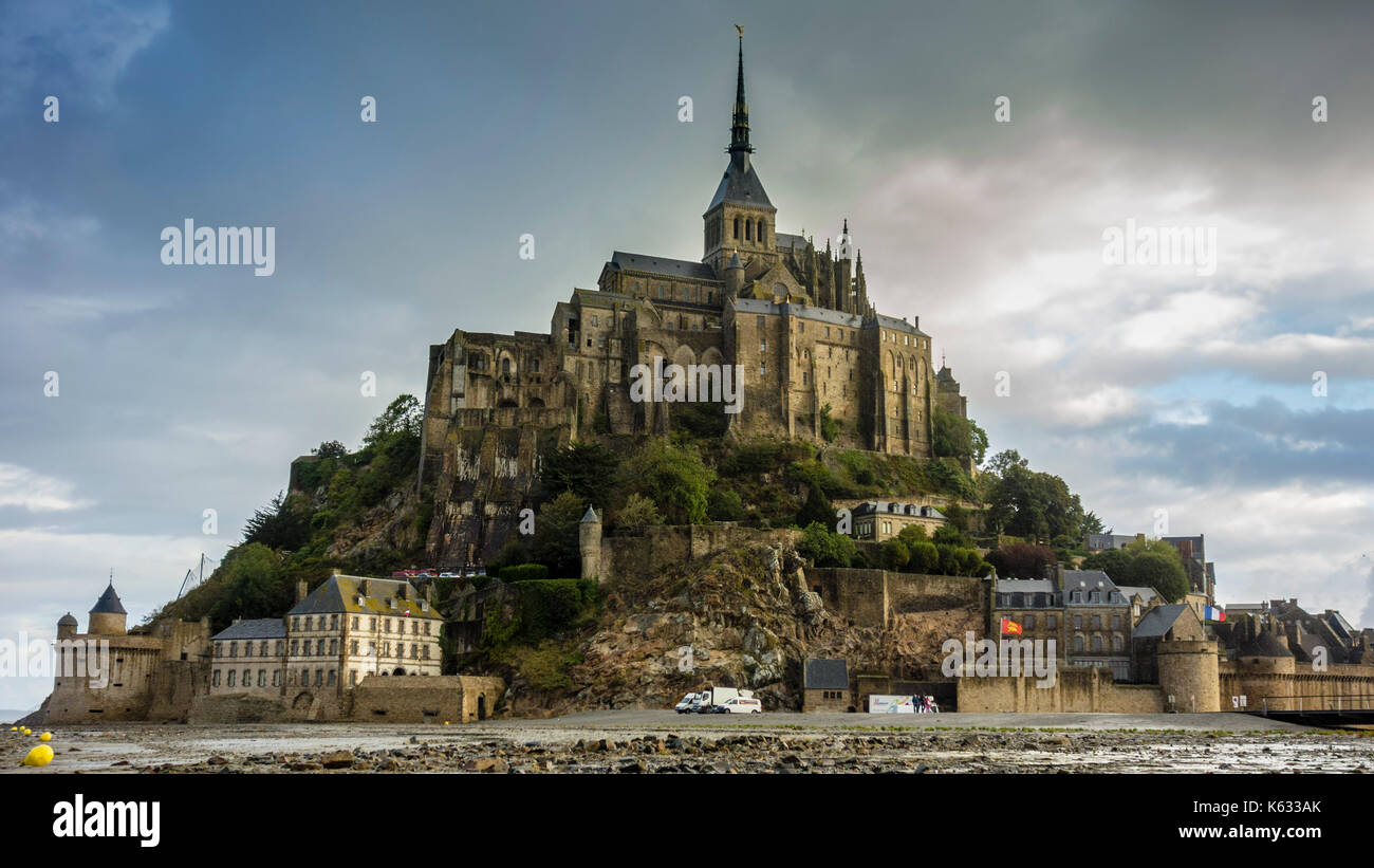 Panoramic view of famous "Le Mont Saint-Michel" tidal island on a sunny ...