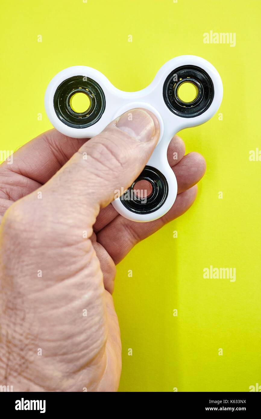 A studio photo of a finger spinner Stock Photo - Alamy